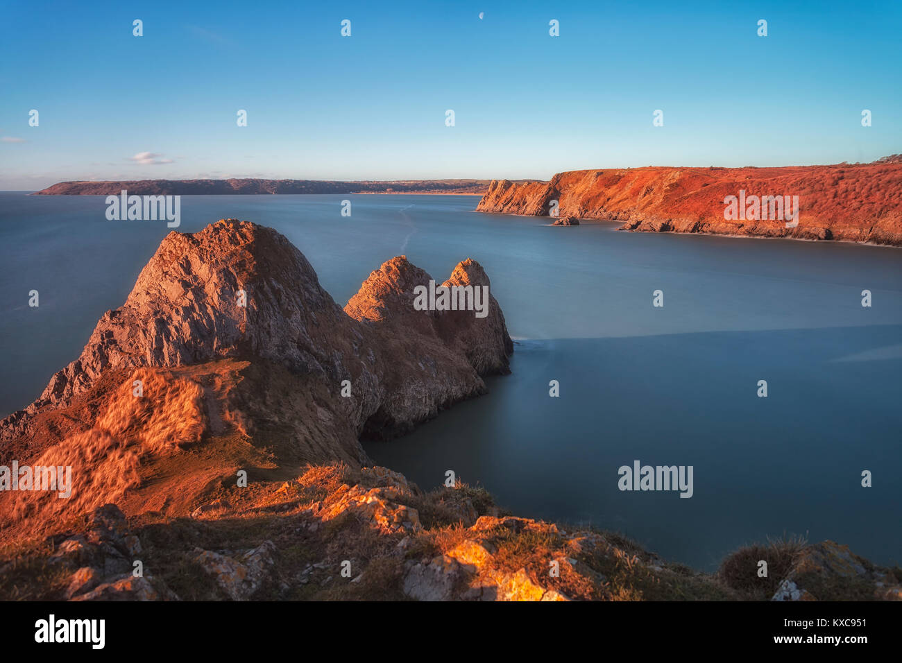 Rugged Three Cliffs Bay and the Great Tor Stock Photo - Alamy
