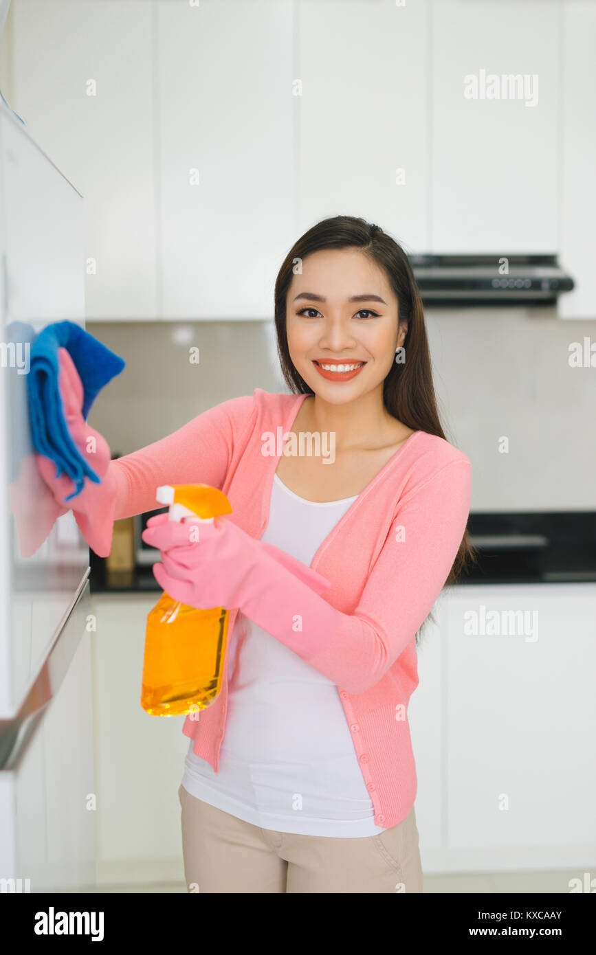 Cleaning products and woman and surface hi-res stock photography and ...