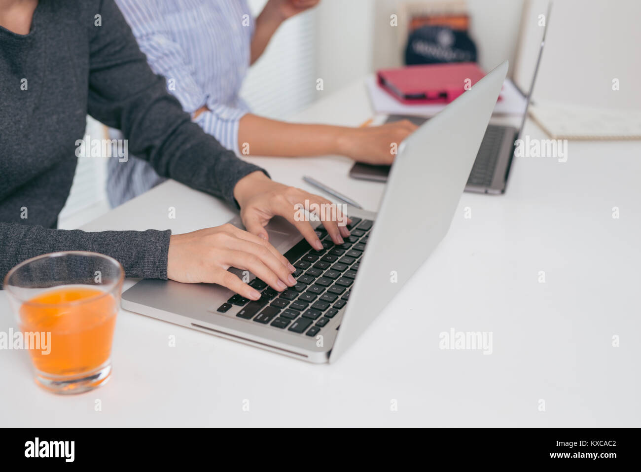 Teamwork. Businesspeople working together with laptop in office Stock ...