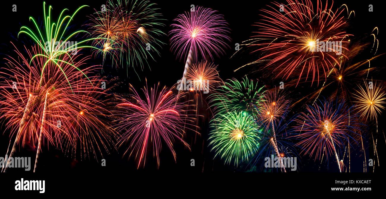 Beautiful fireworks fill the night time sky Stock Photo - Alamy