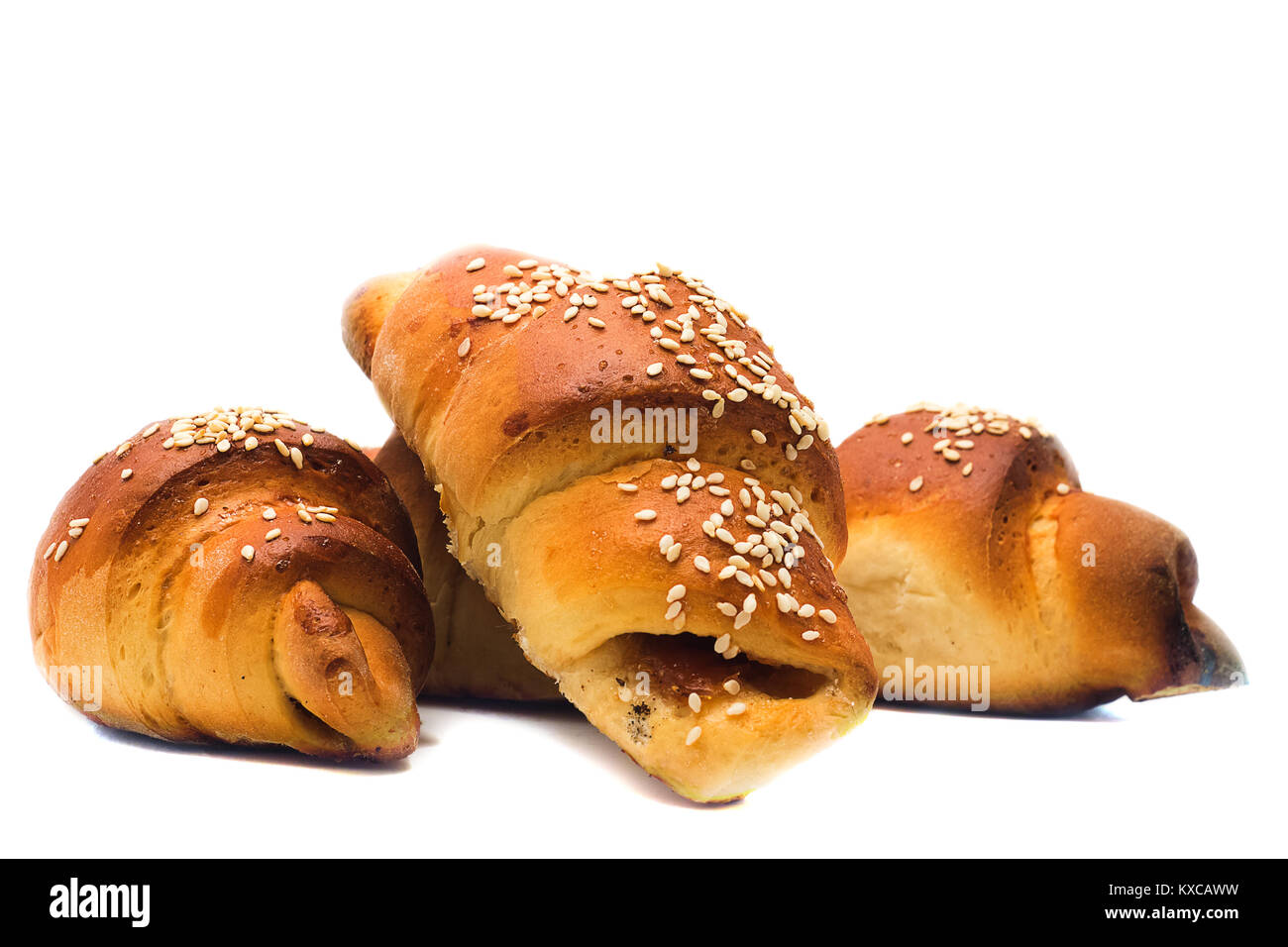 Three buns on a white background closeup Stock Photo - Alamy
