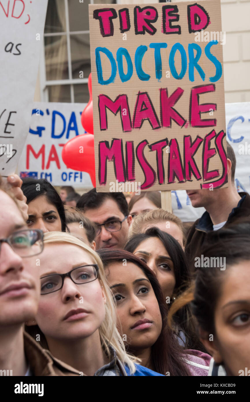 A placard at the Junior doctors protest rally against new contract ...