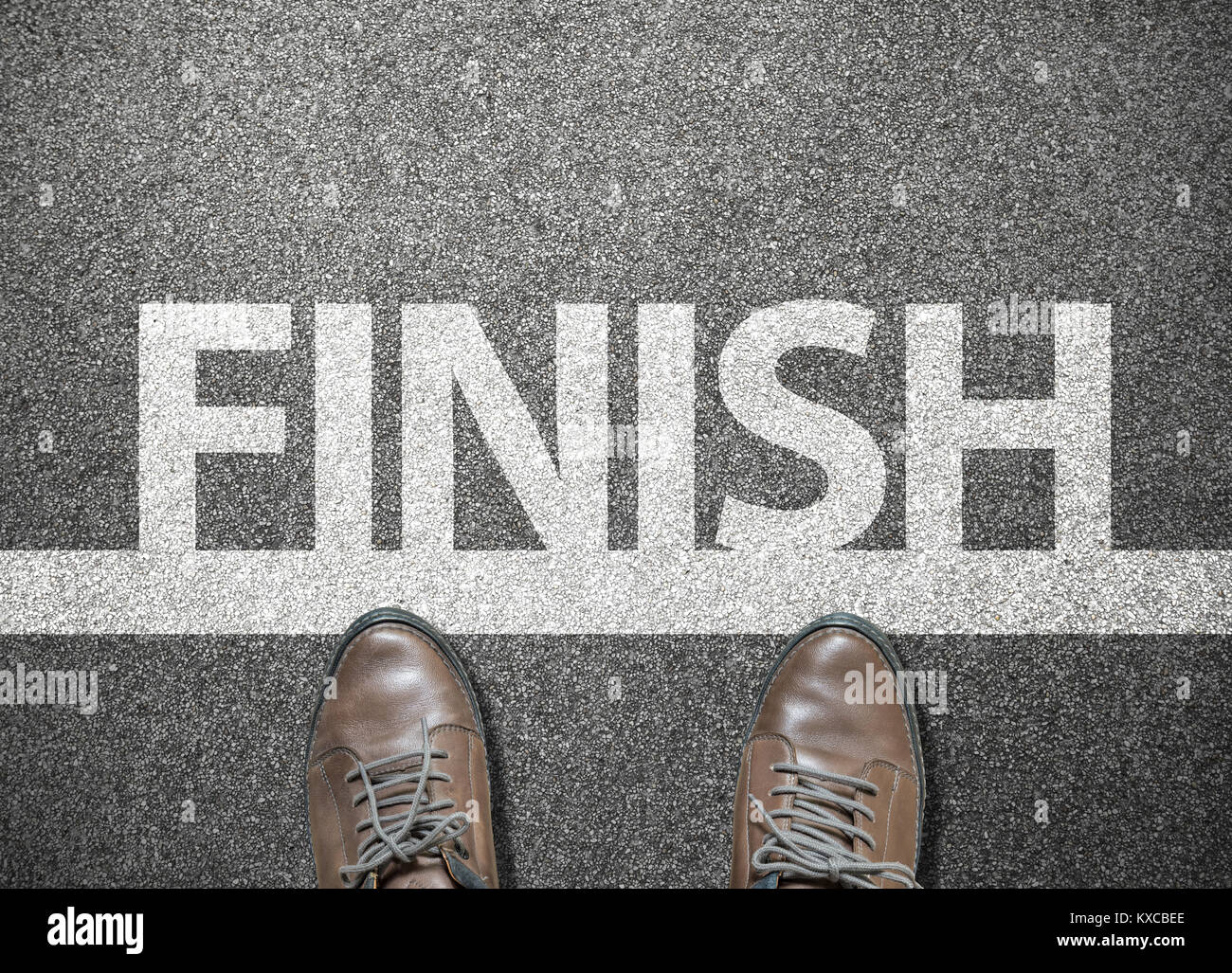 businessman shoes stand at finish line, successful concept Stock Photo ...