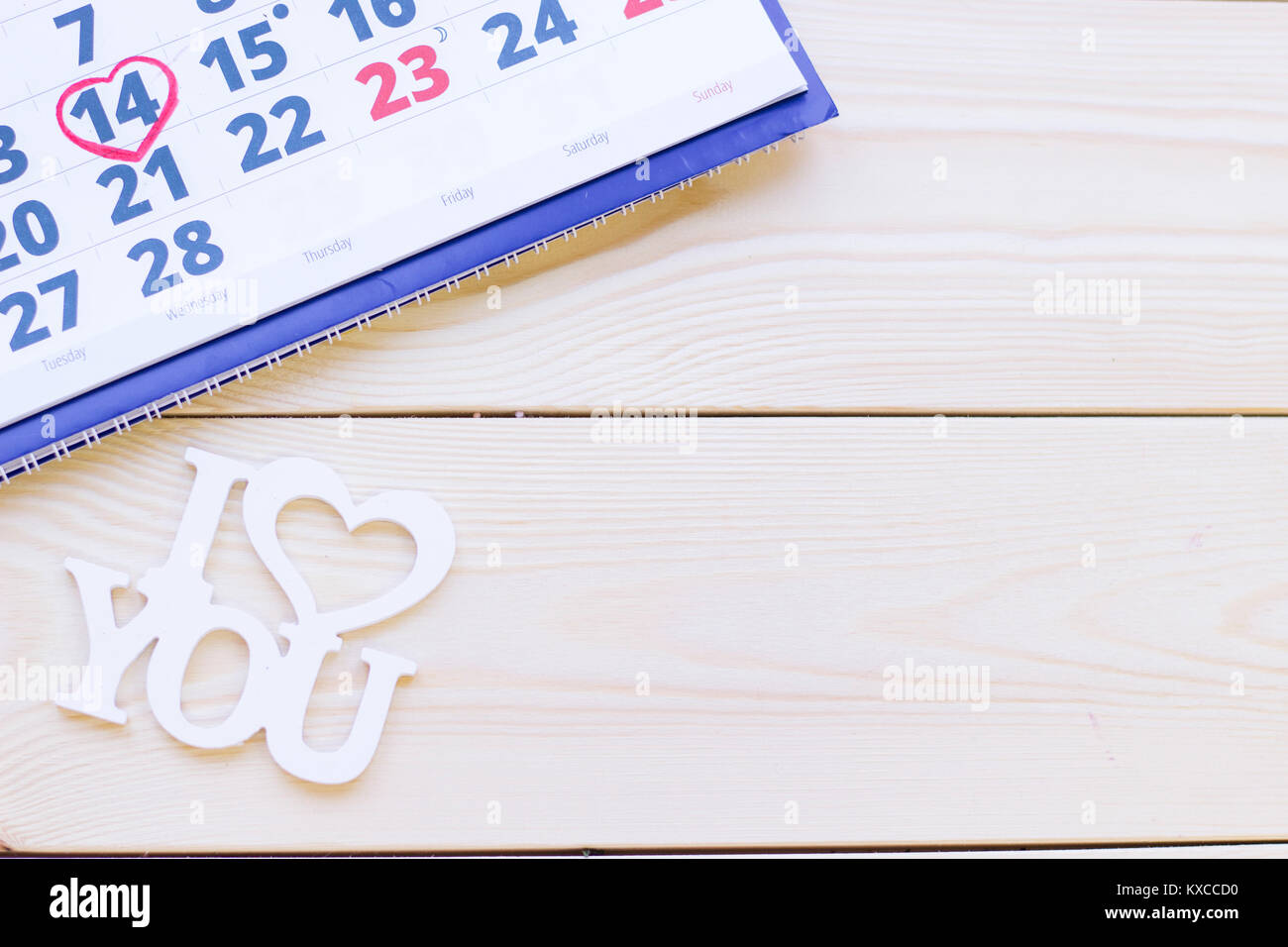 Wooden background with a calendar Stock Photo - Alamy