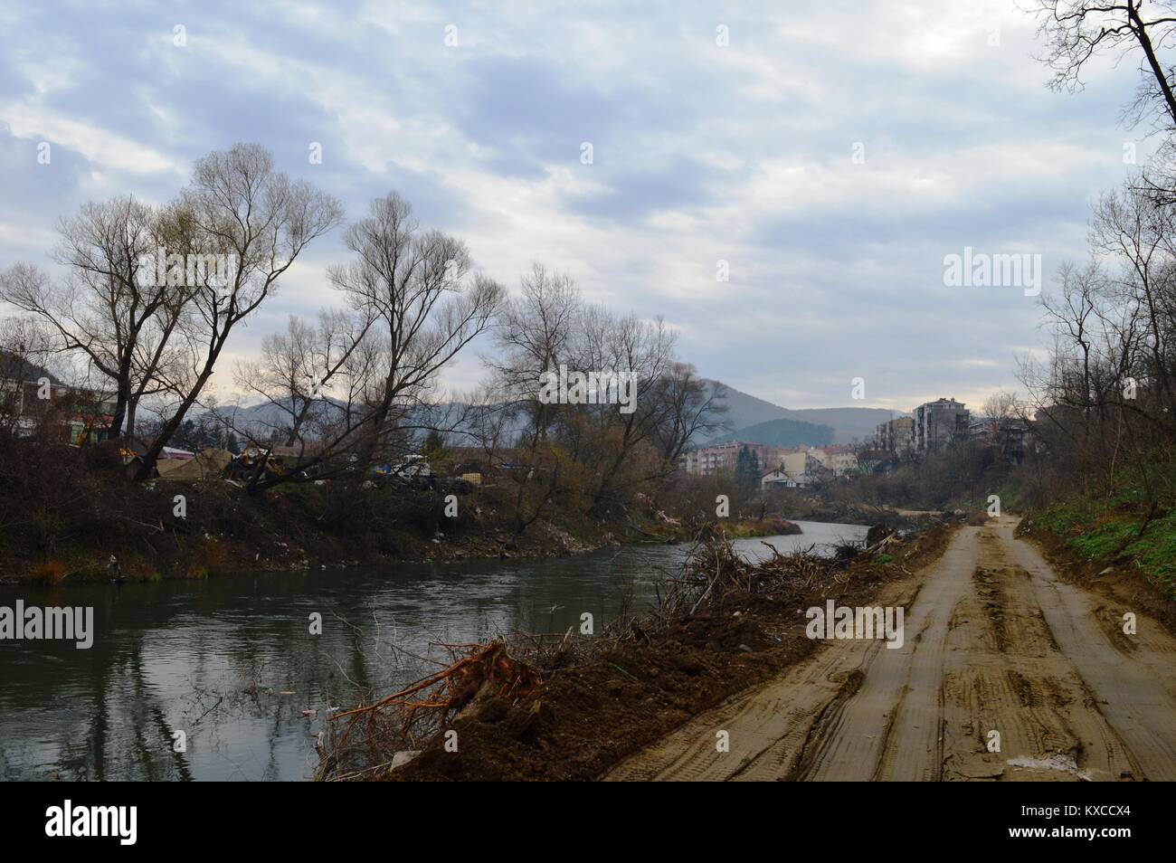 earthy road by the river Stock Photo - Alamy