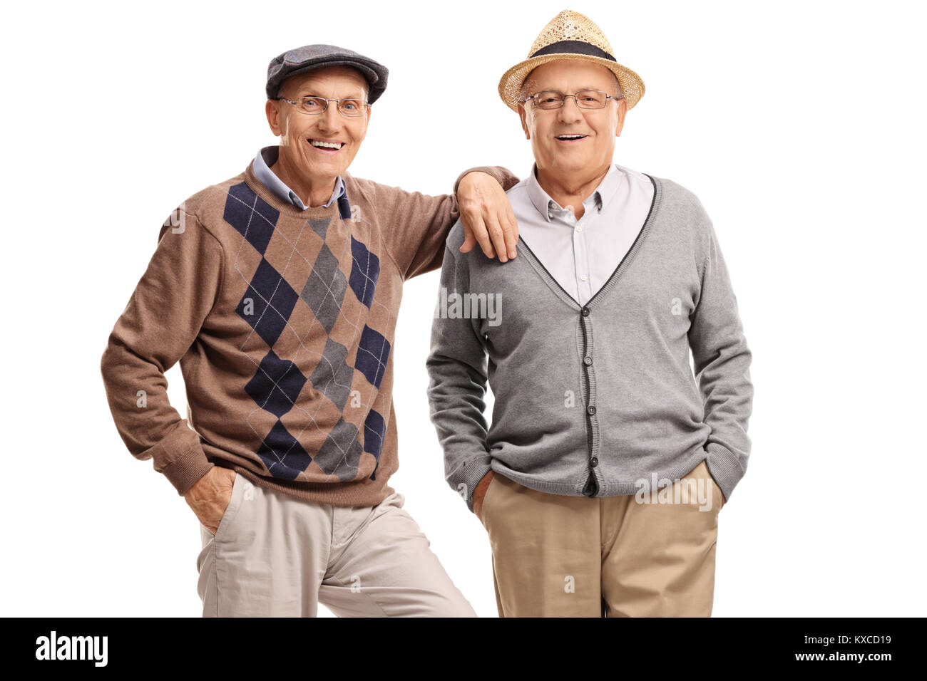 Two elderly men looking at the camera and smiling isolated on white ...