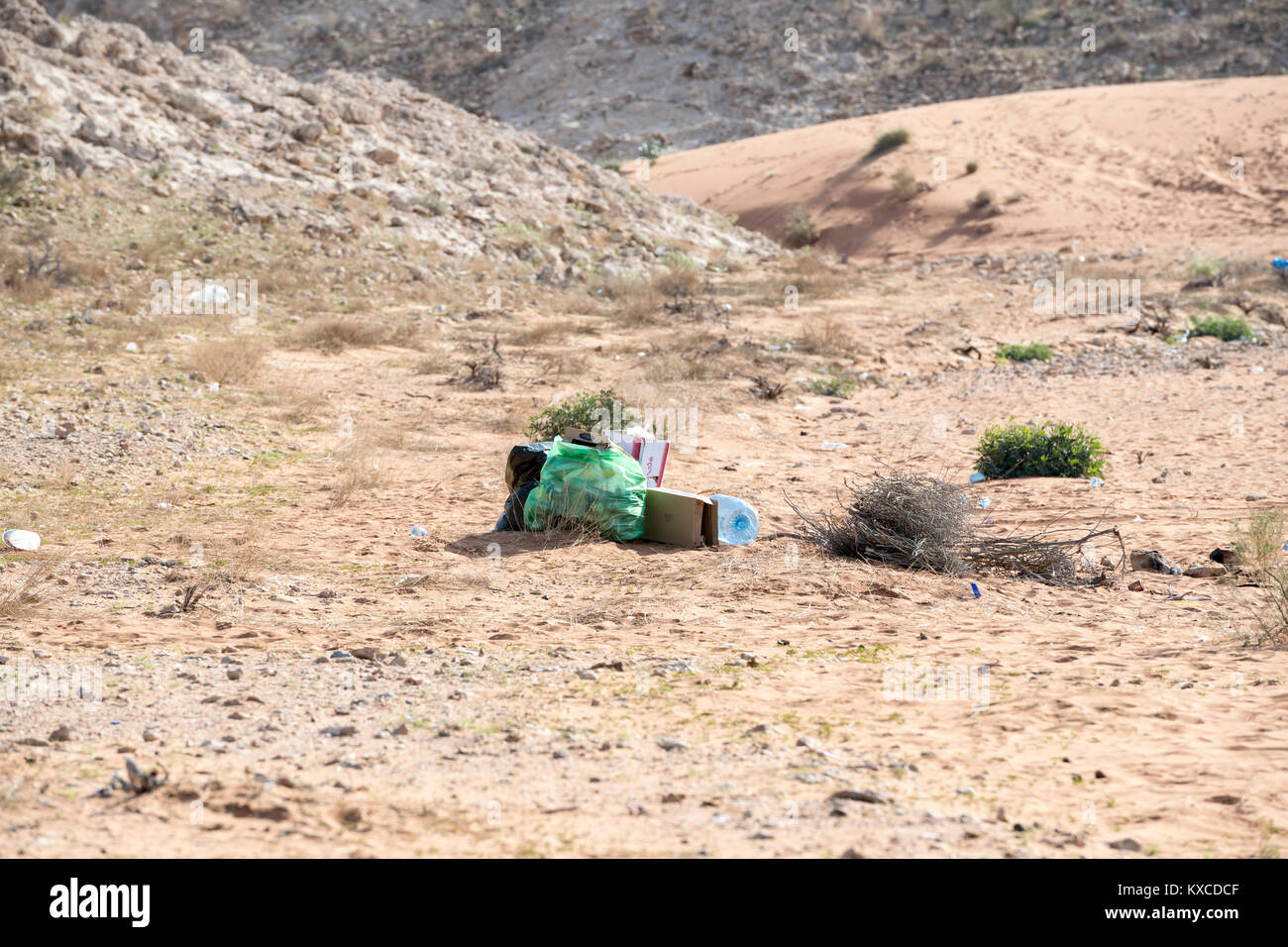Garbage left in Desert, Discarded plastic bags, bottles, and other ...