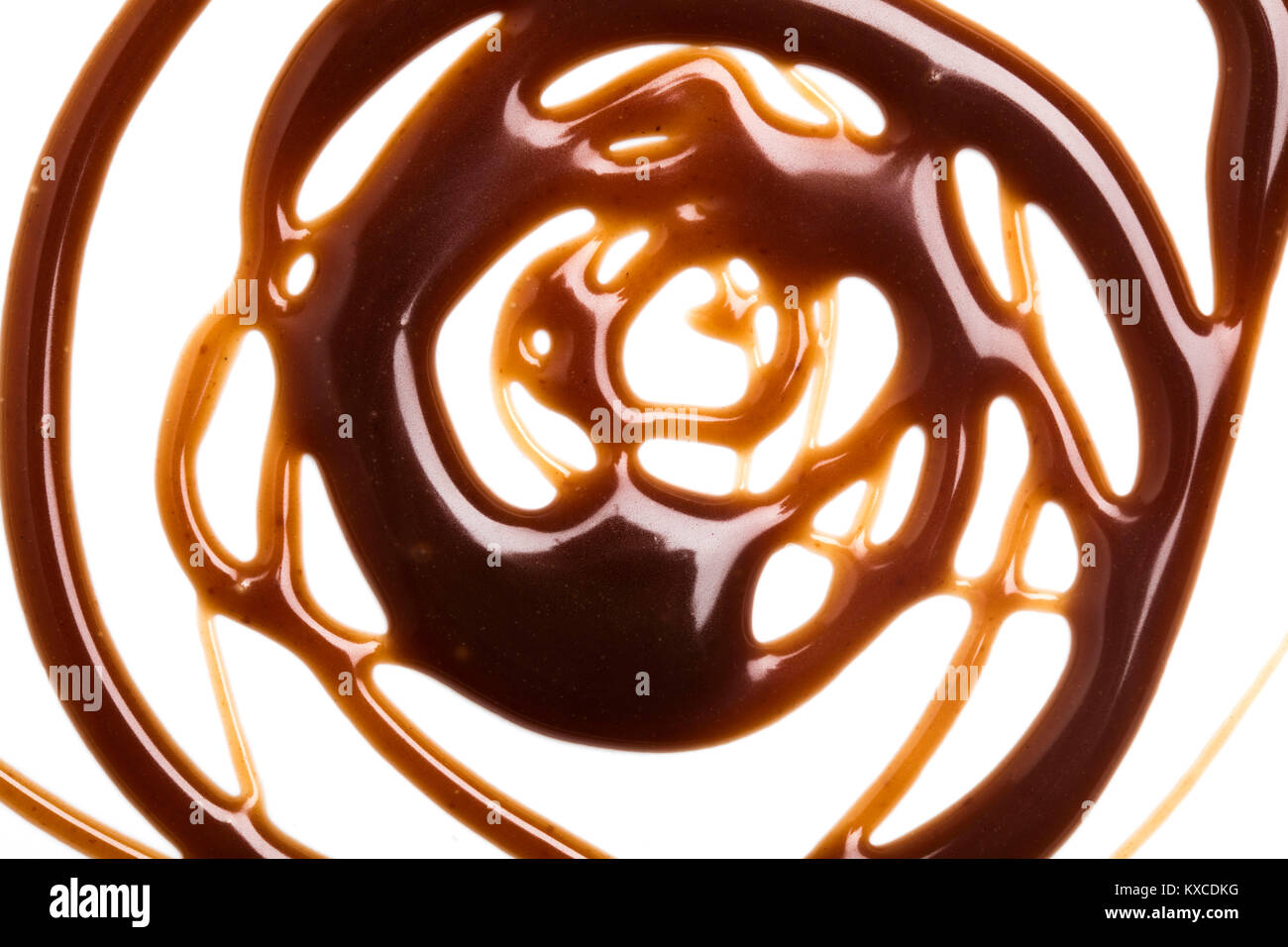 Chocolate caramel sauce swirl on a plain white backround Stock Photo ...