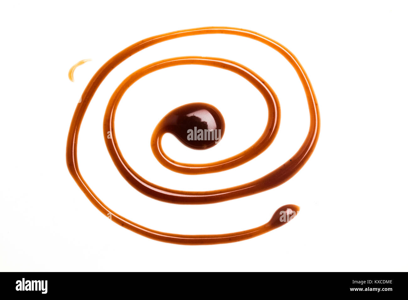 Chocolate caramel sauce swirl on a plain white backround Stock Photo ...