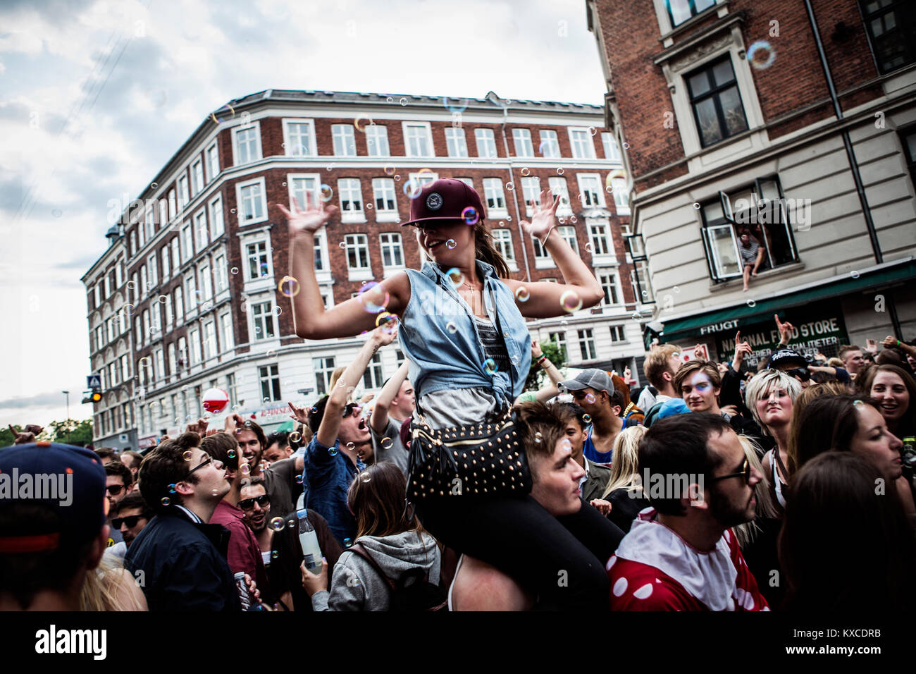 Party people is having a crazy good time with beer, music and dancing ...