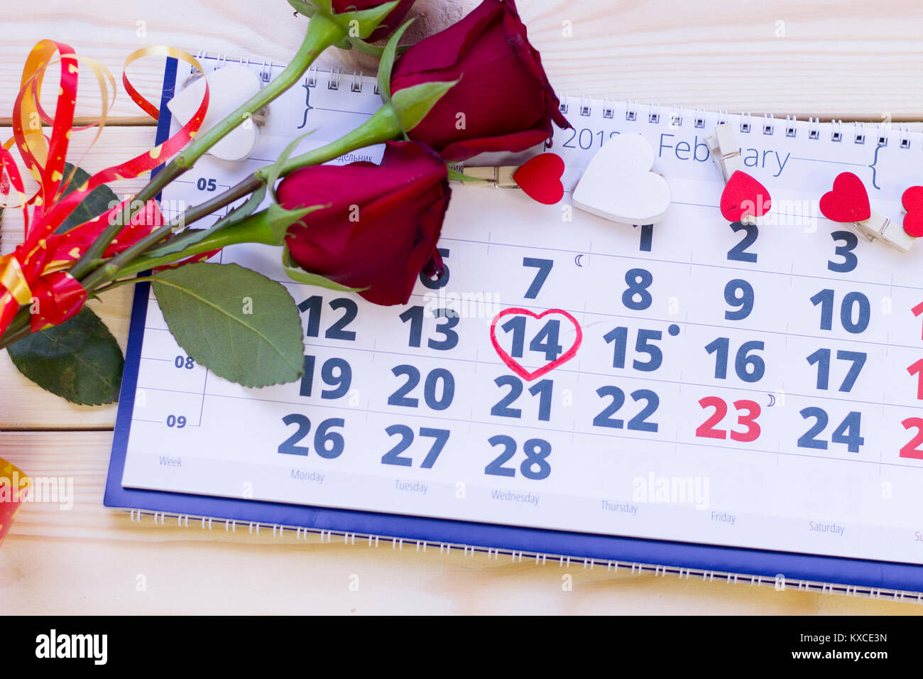Red roses and calendar Stock Photo - Alamy