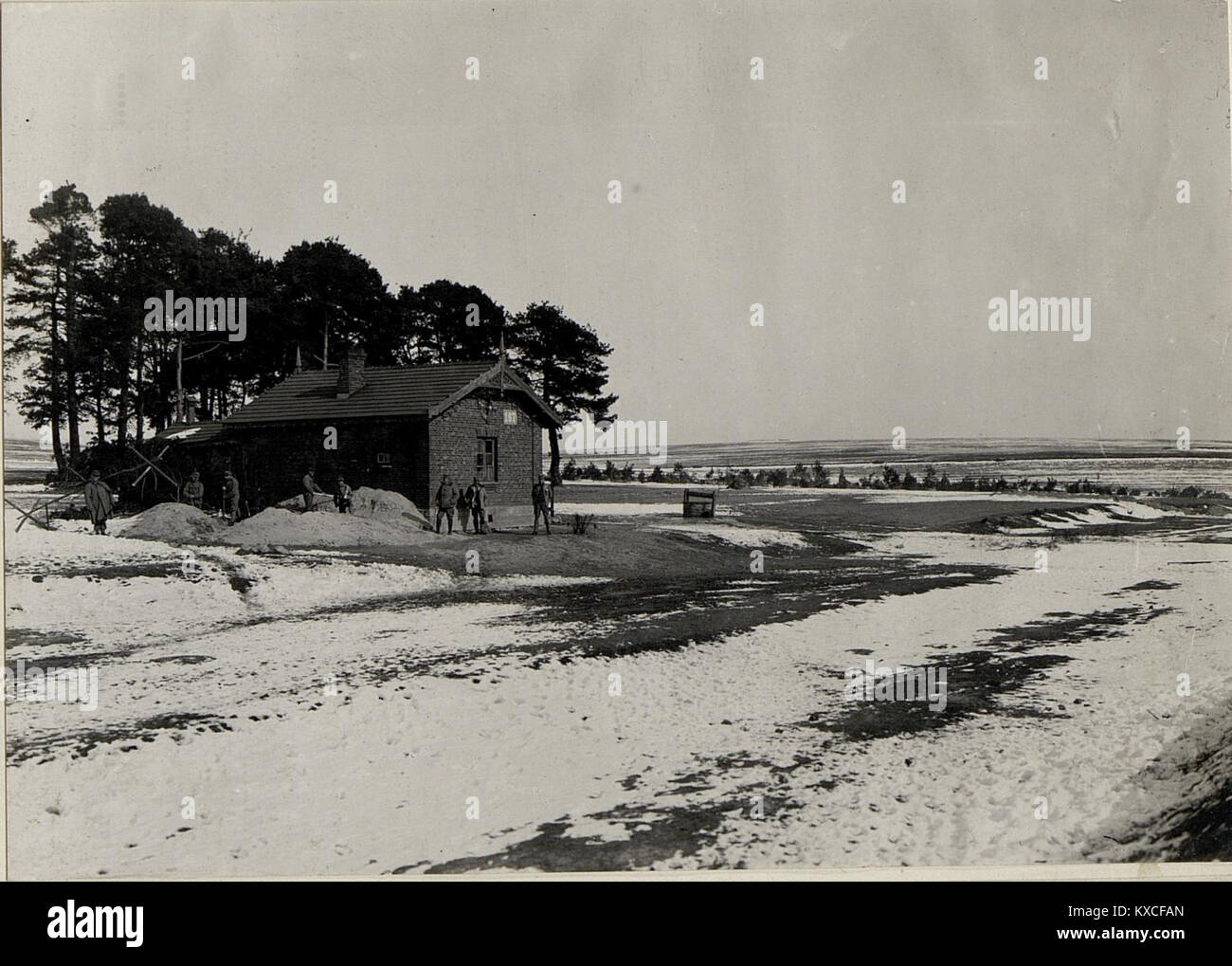A World War I military photograph depicting the concealed Howitzer ...