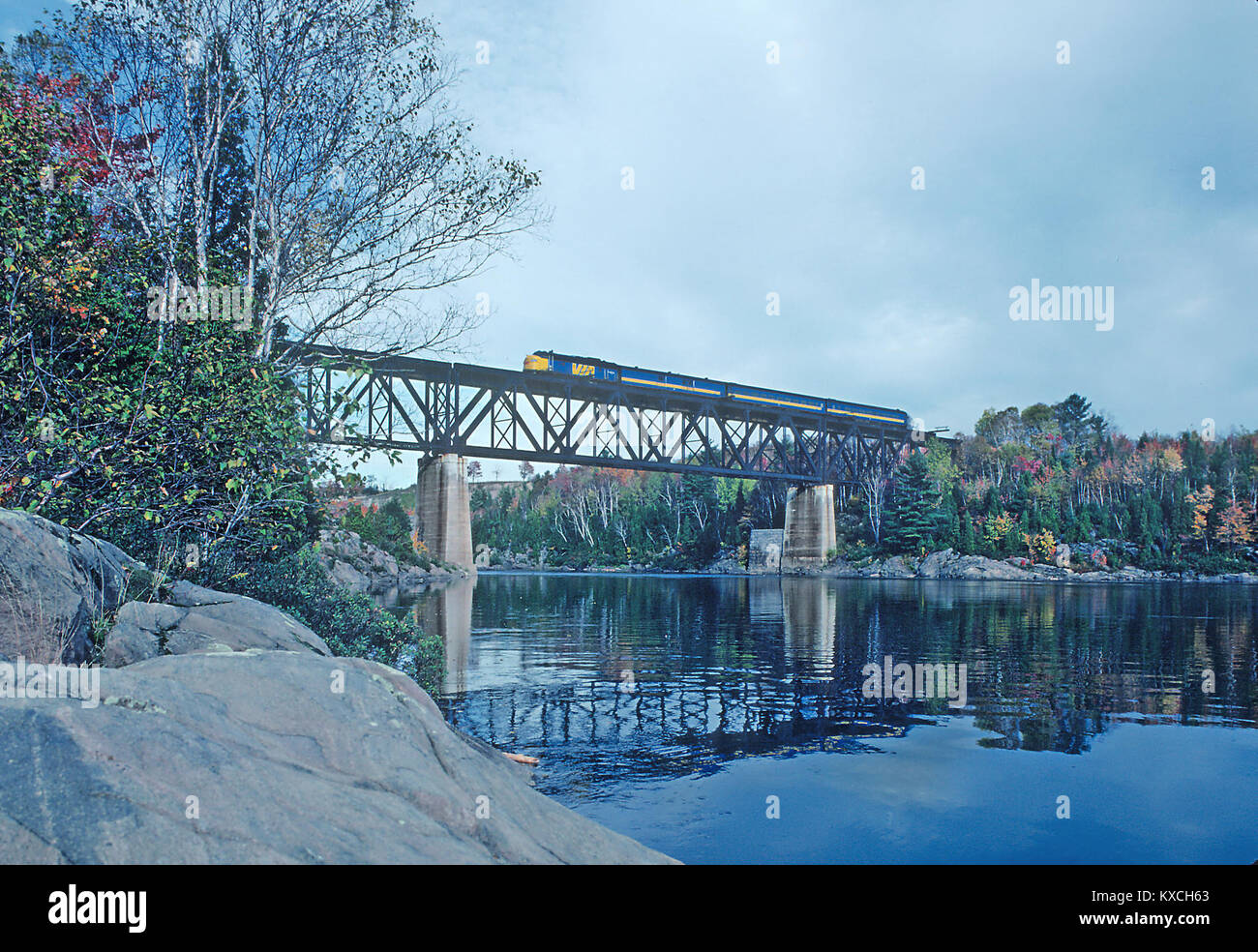 A photograph of the VIA train crossing the bridge over the St-Maurice ...