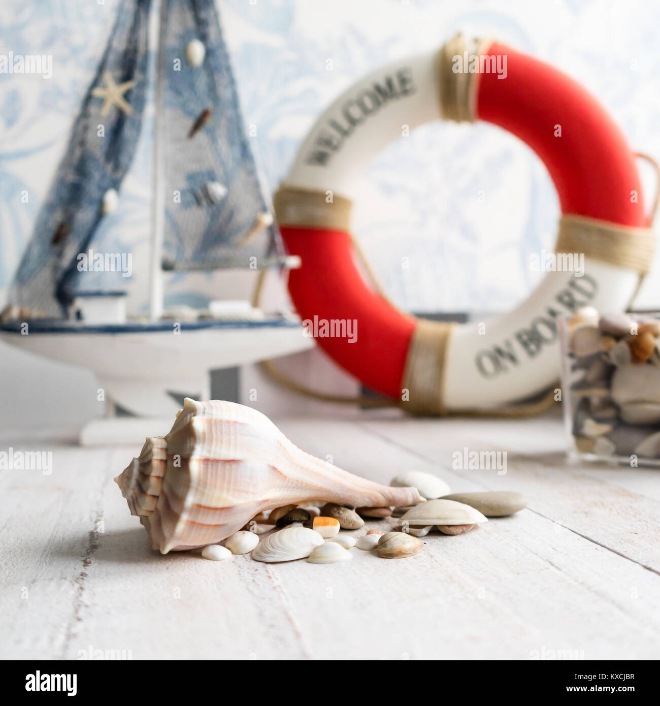 Sea theme decorations of the kids room, such as cute wooden boat, sea ...