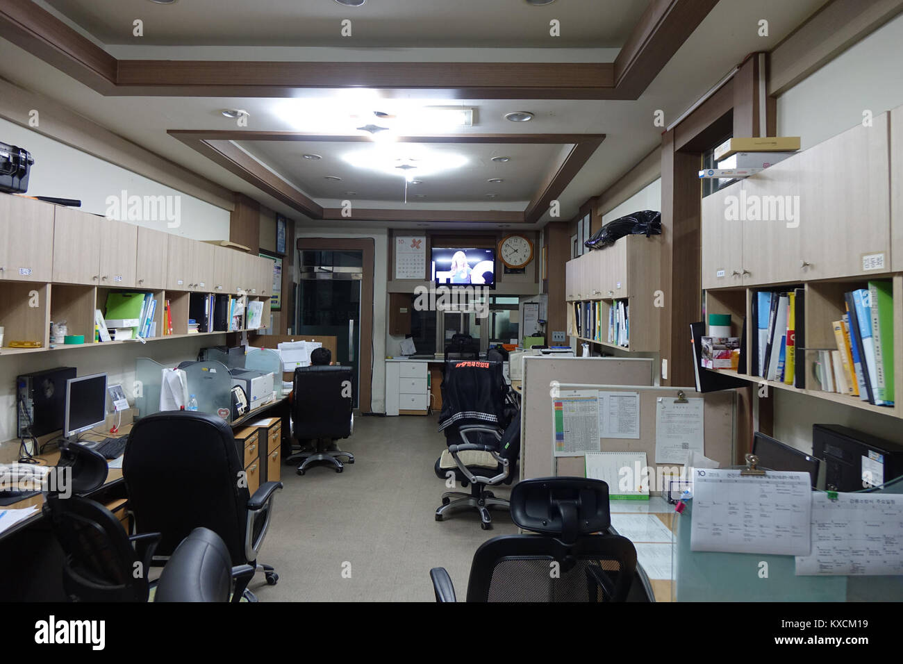 This photograph captures an antechamber with a small cabinet in the ...