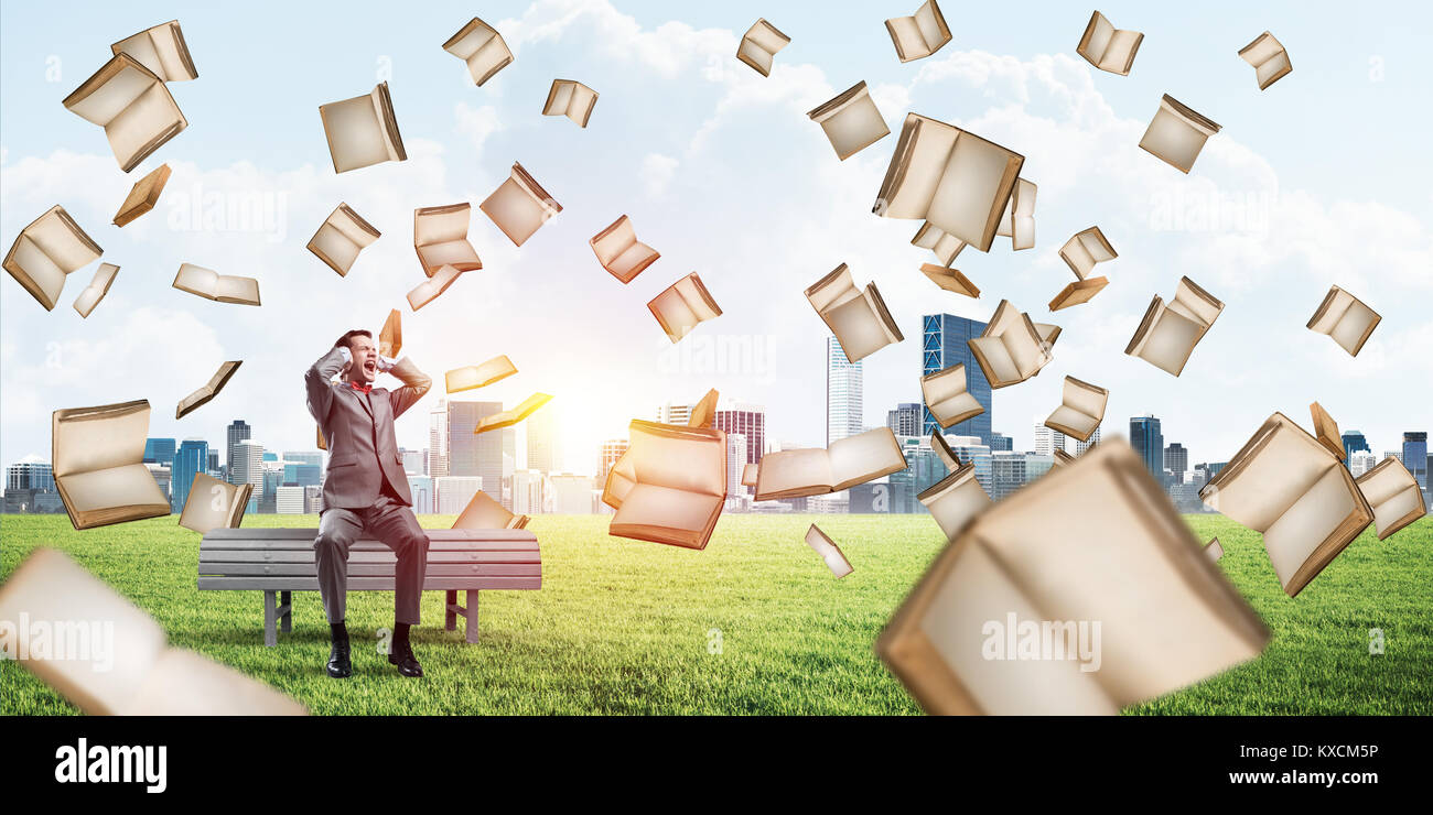 Book falling grass hi-res stock photography and images - Alamy