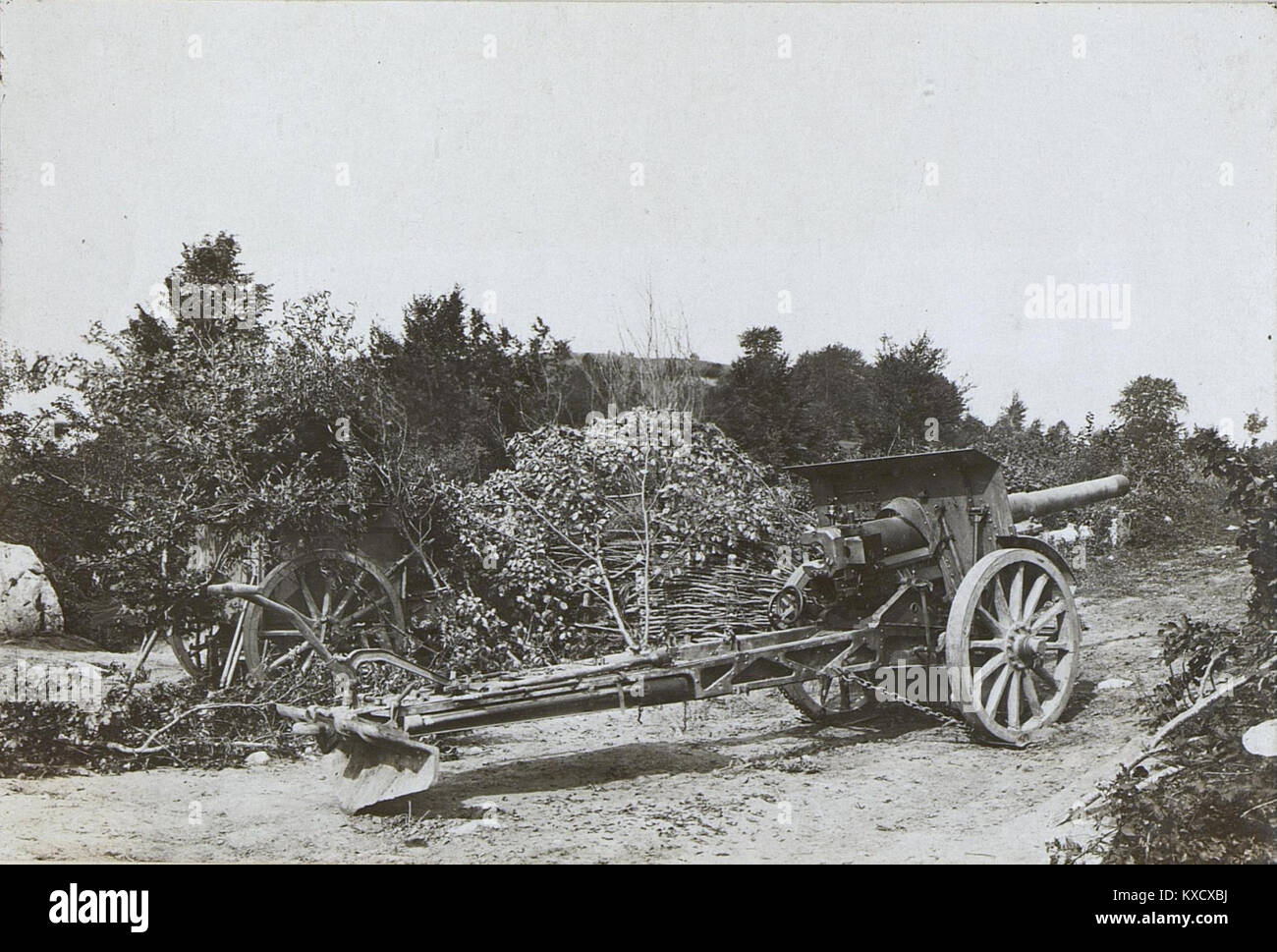 This image likely depicts a 10.4 cm artillery gun in a firing position ...