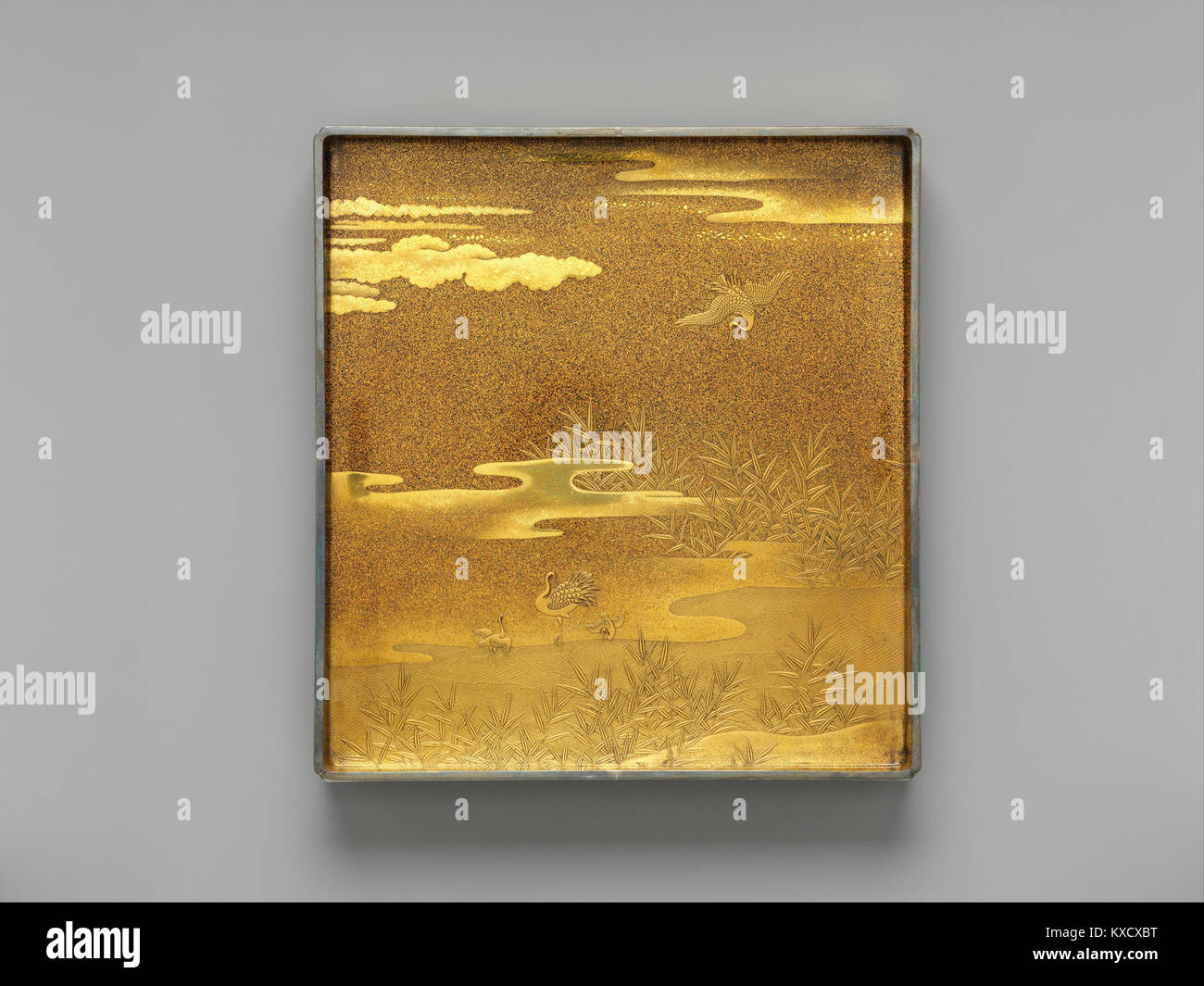 This image features a traditional Japanese writing box (Suzuribako) and ...