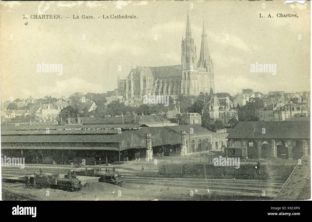 This photograph depicts Chartres, France, highlighting the Gare (train ...