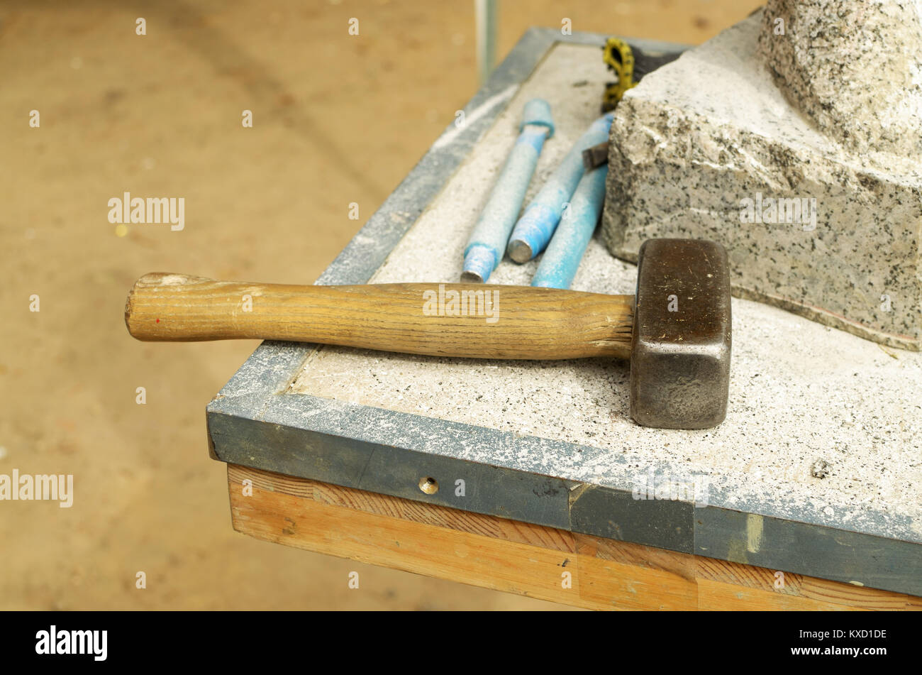 A sculptor uses a hammer to work in his Studio Stock Photo - Alamy