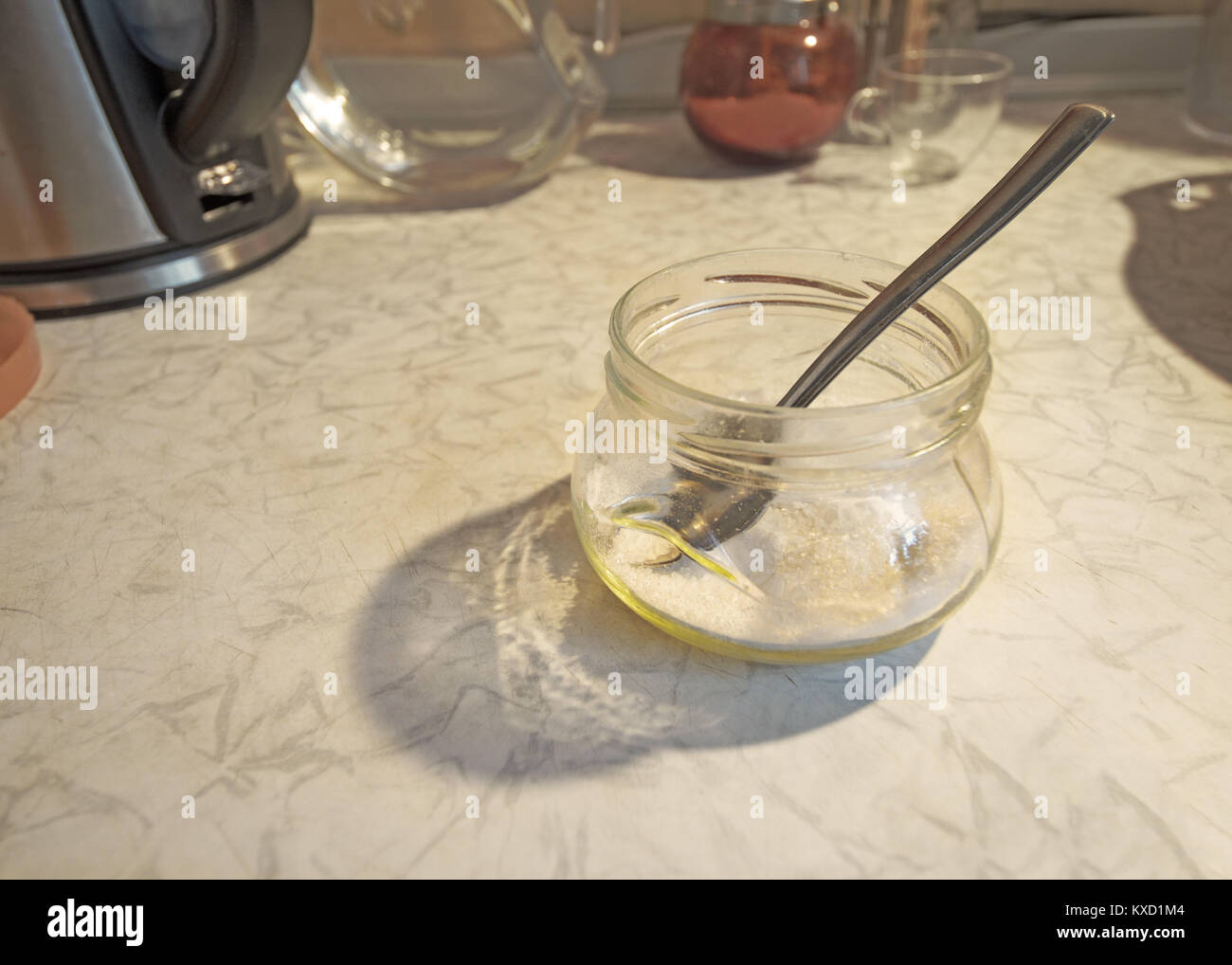 Bank storage salt is to cooking .Lying on the kitchen table Stock Photo ...