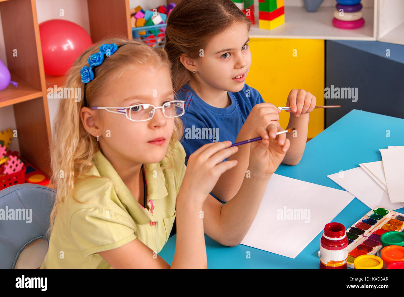 Small students children painting in art school class Stock Photo - Alamy