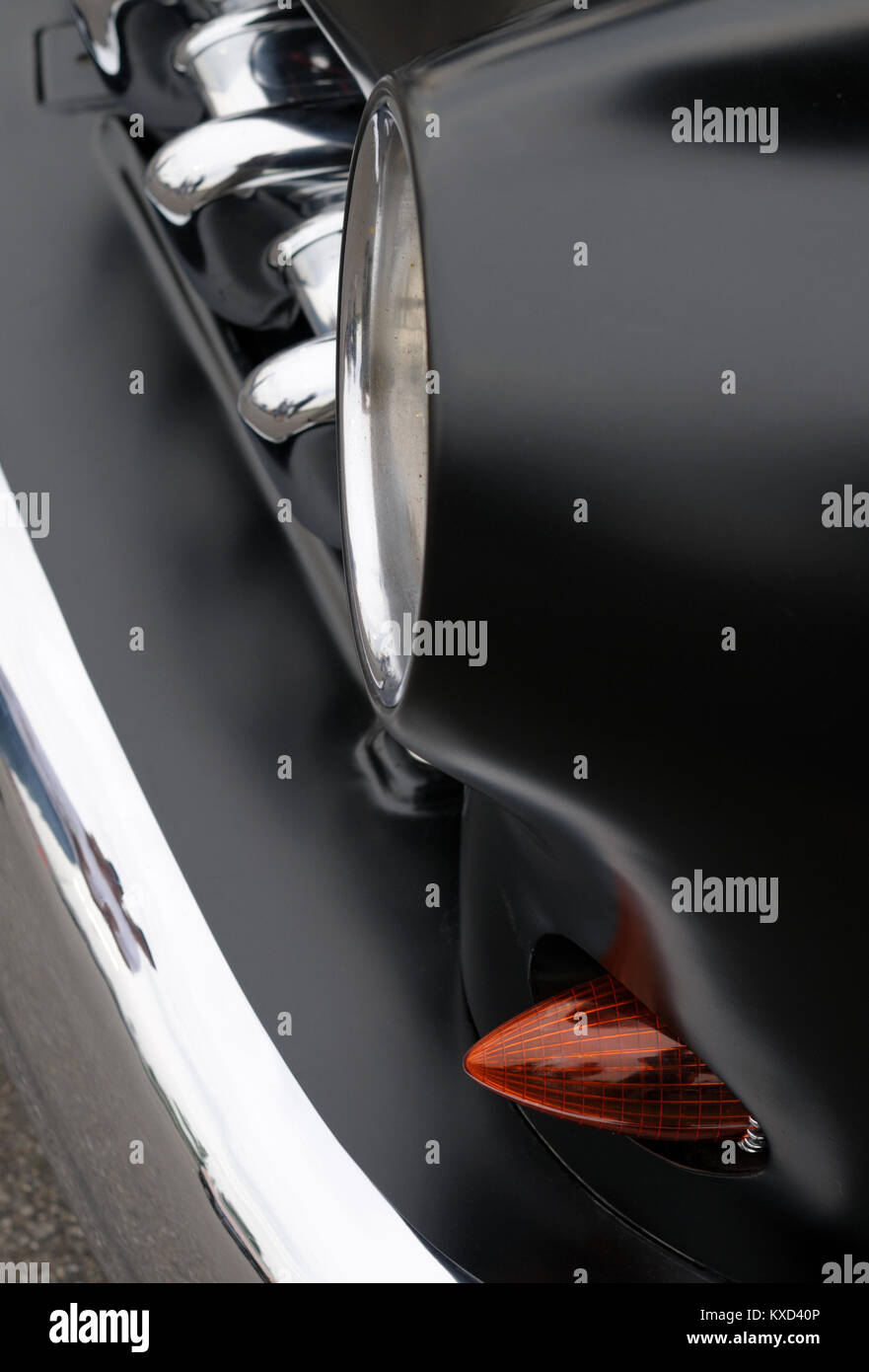 Front red bullet signal light on a flat satin black classic American ...