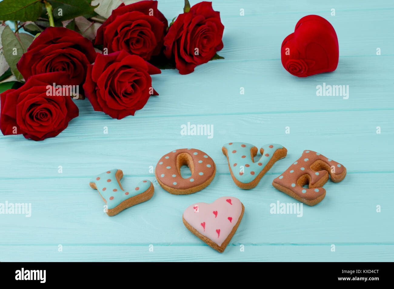Red roses and letter cookies Stock Photo - Alamy