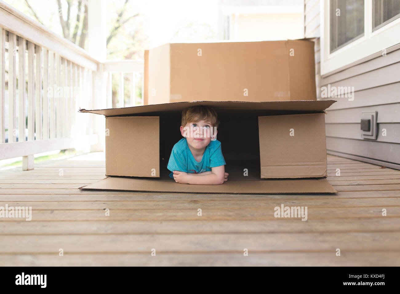 Boy On Balcony High Resolution Stock Photography and Images - Alamy
