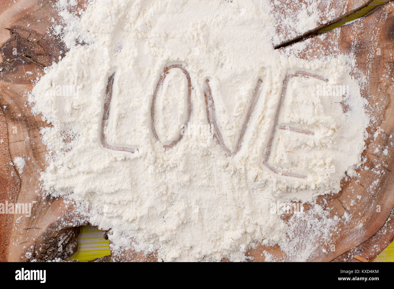 Word love written on white flour Stock Photo - Alamy