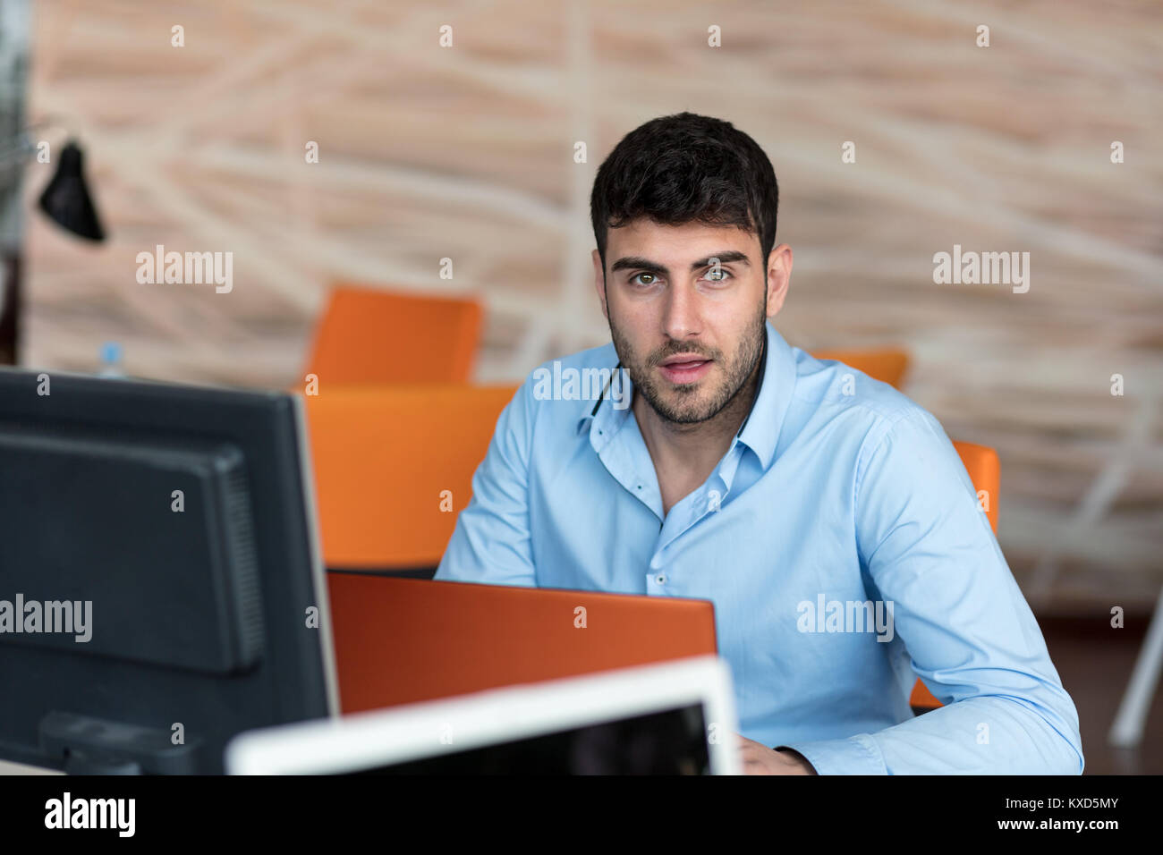 Freelance programmer working in startup office Stock Photo - Alamy