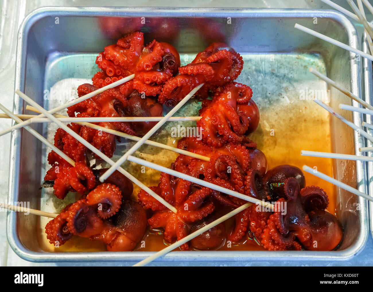 Boiled Tiny Octopus sold at Nishiki Market in Kyoto Stock Photo - Alamy