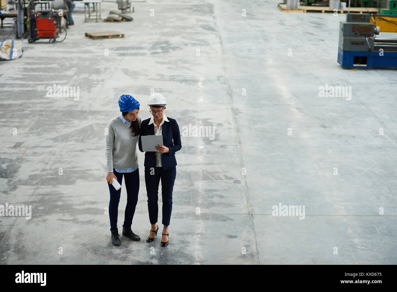 Female Crew Working at Factory Stock Photo - Alamy