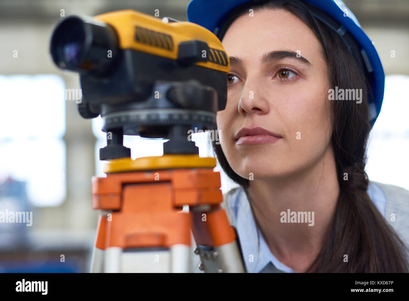 Woman Working in Construction Surveying Stock Photo - Alamy