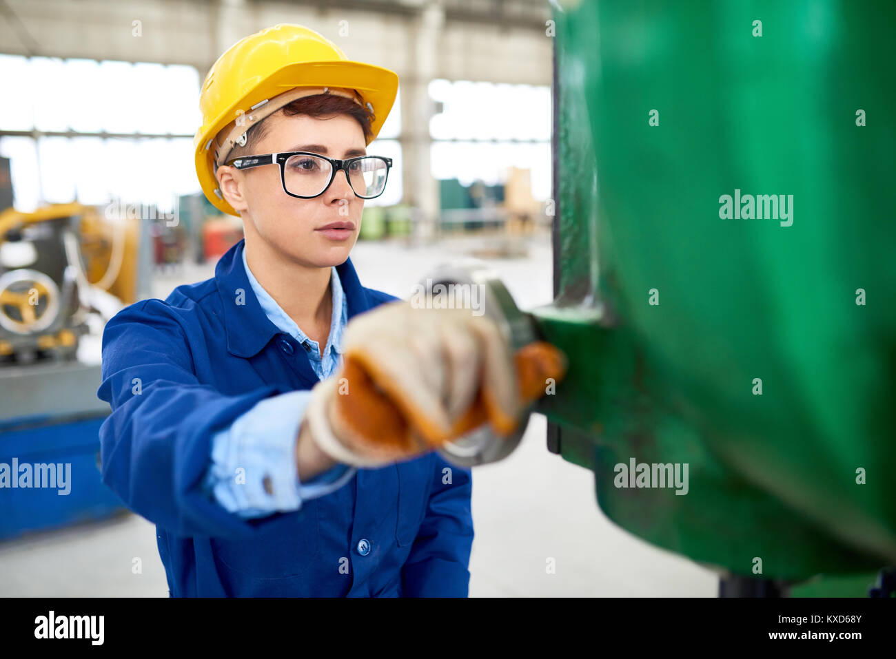 Female Engineer Working at Factory Stock Photo - Alamy