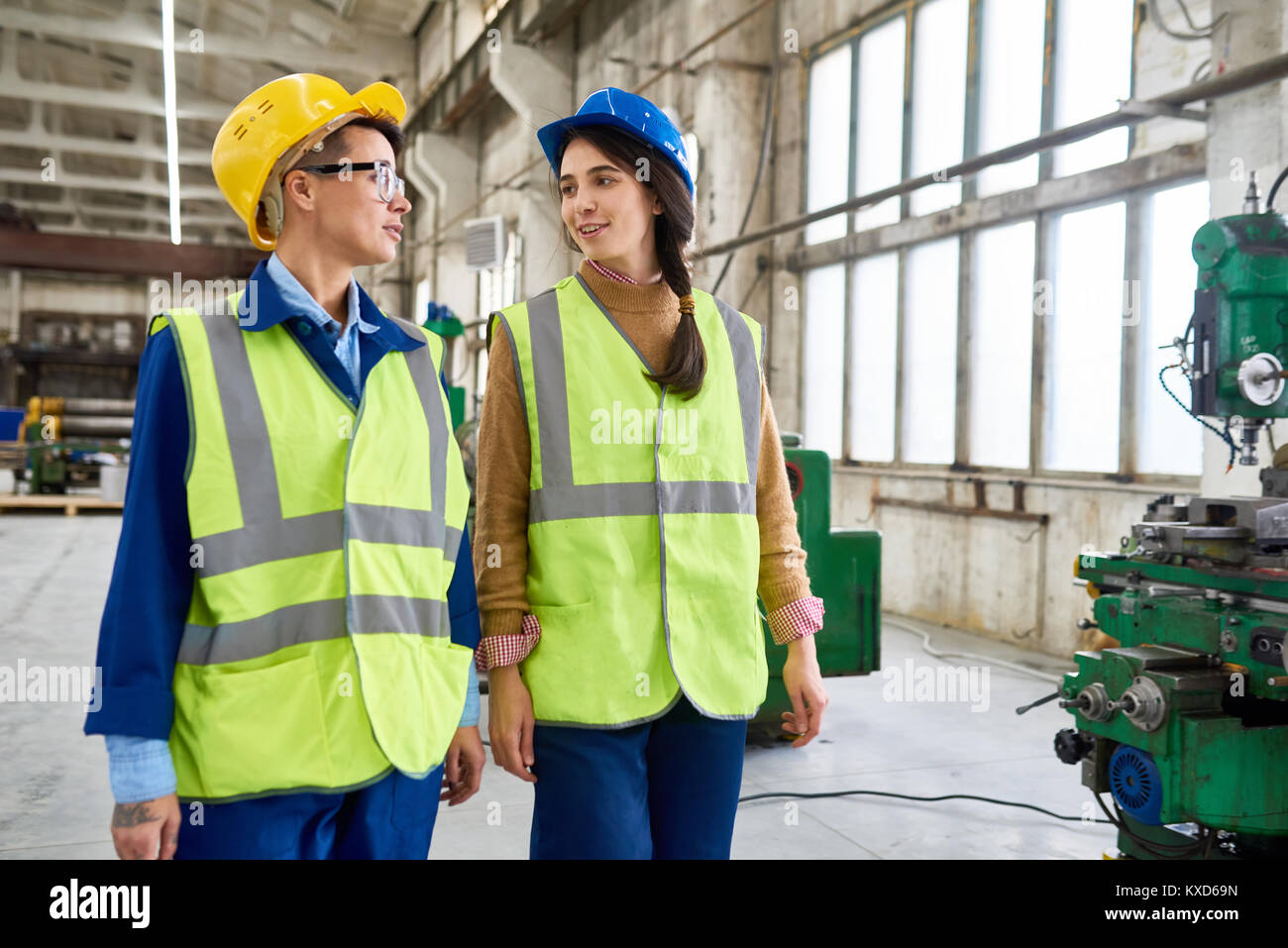 Two Female Workers at Modern Plant Stock Photo - Alamy