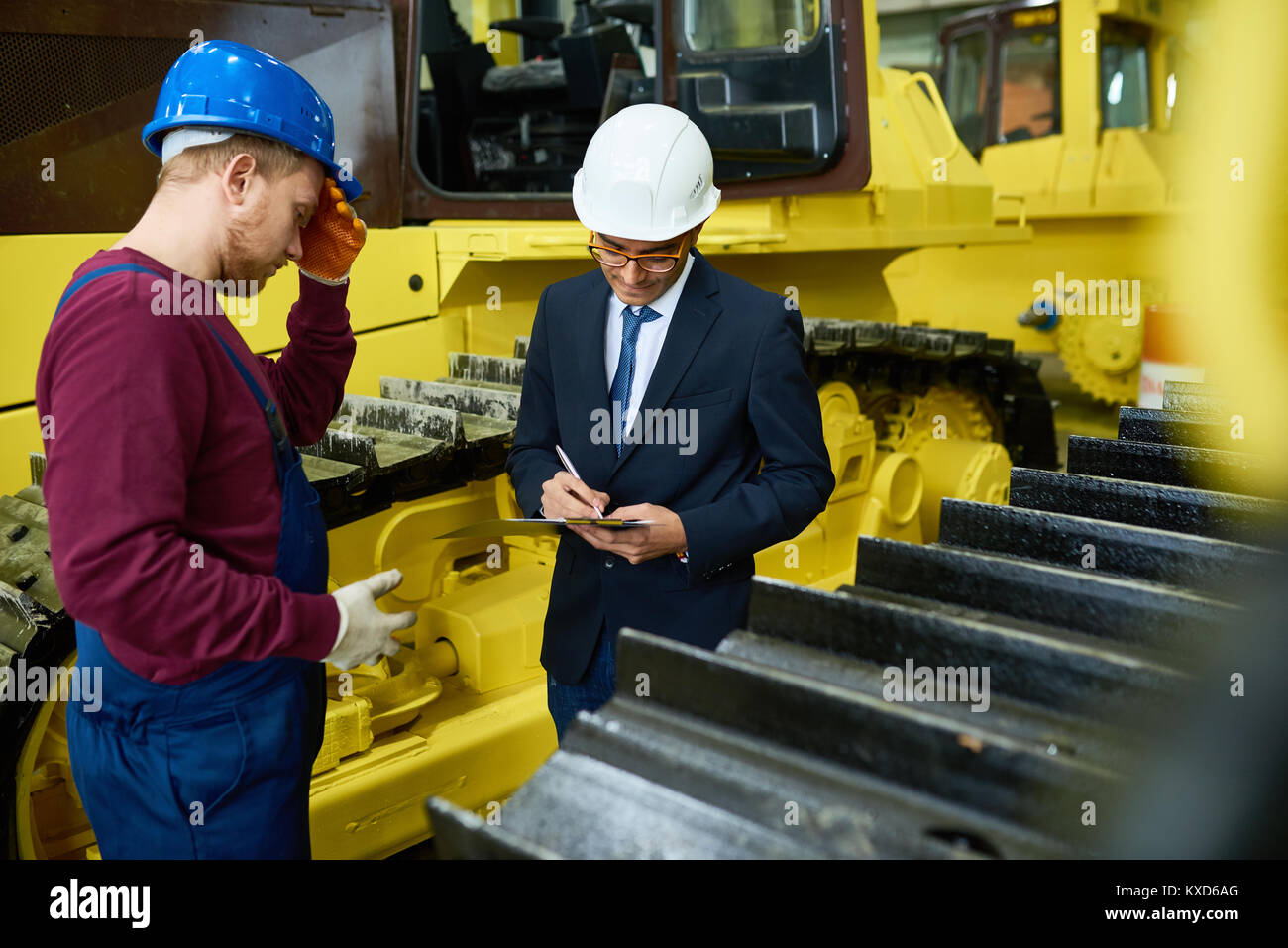 Giving Tour of Modern Factory Stock Photo - Alamy