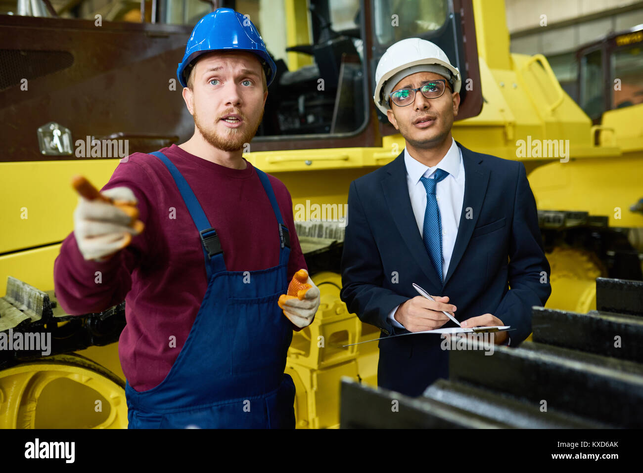 Carrying out Inspection in Factory Warehouse Stock Photo - Alamy