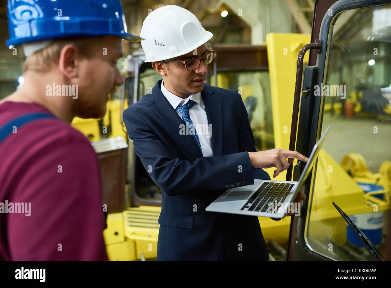 Taking Inventory at Factory Warehouse Stock Photo - Alamy