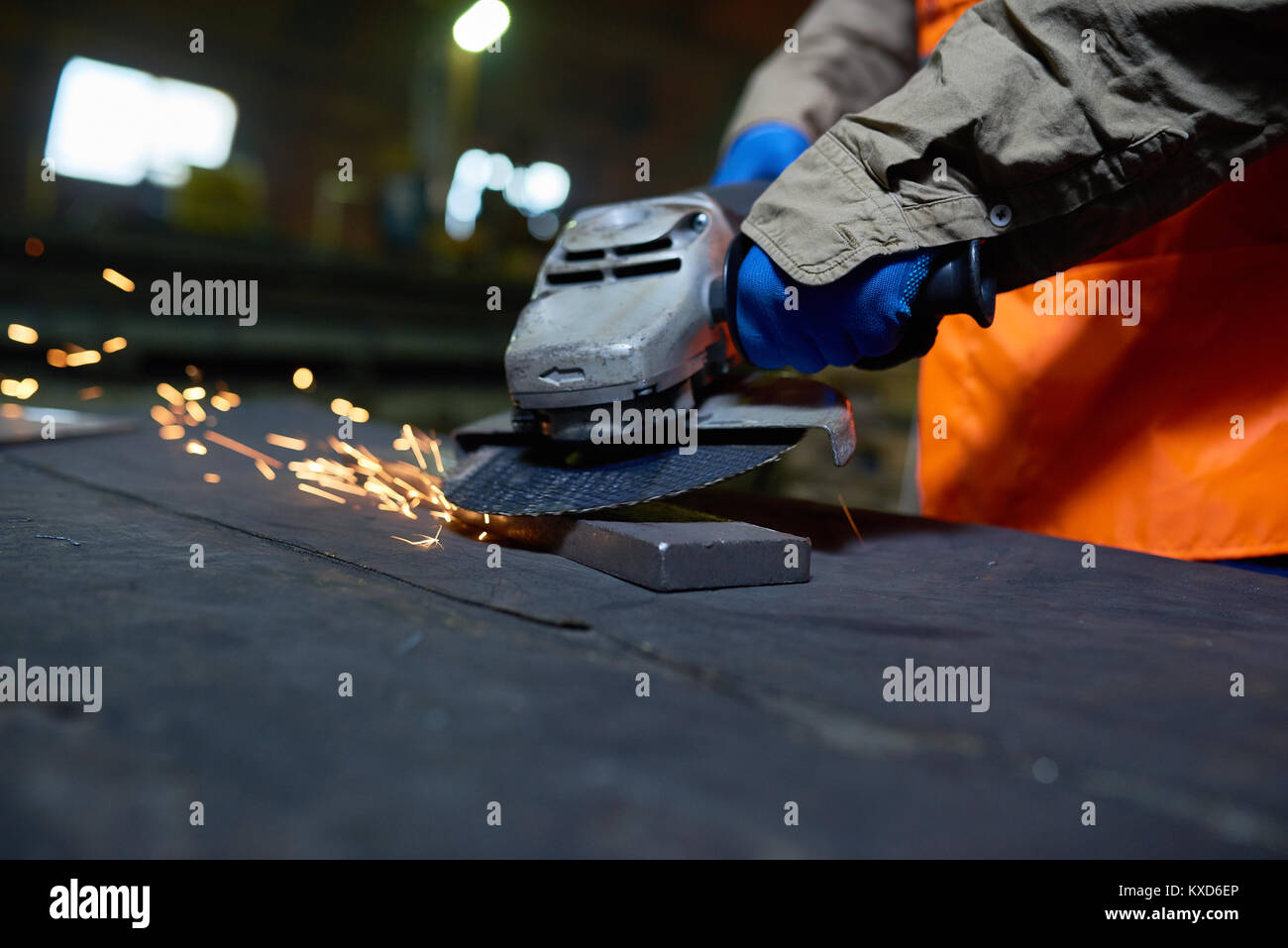 Hands worker using angle grinder hi-res stock photography and images ...