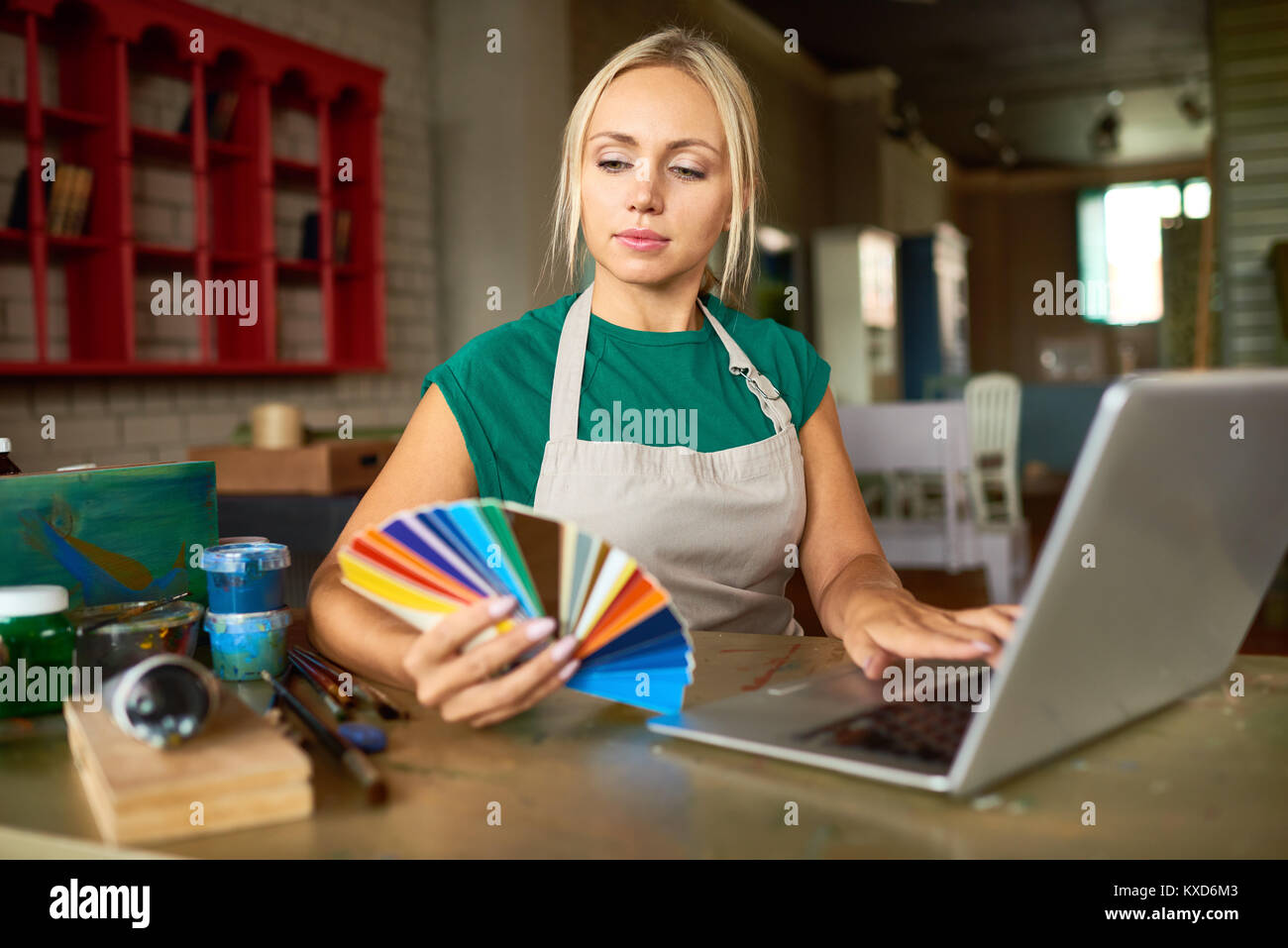 Professional Artist Working in Workshop Stock Photo - Alamy