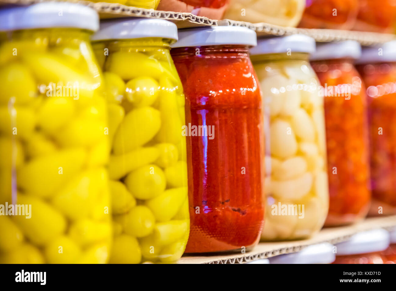 Store shelves with Various pickles in glass jar display for sale Stock ...