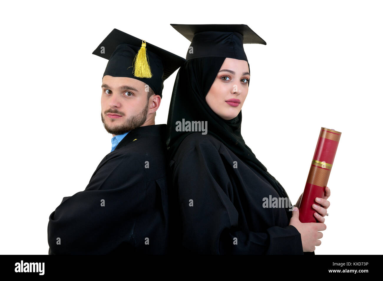 Portrait of two happy graduating arabic muslim students. Isolated over ...