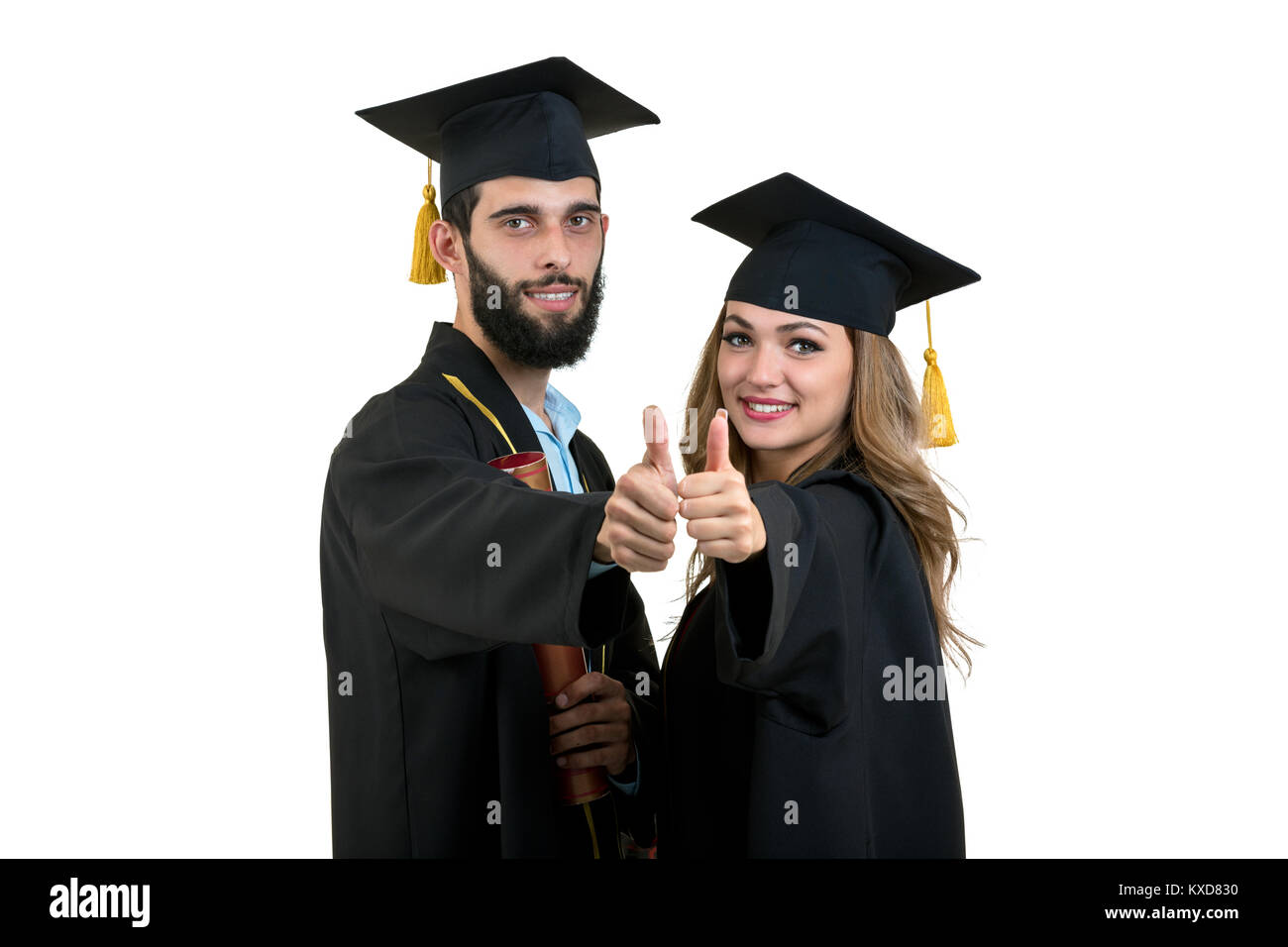 Portrait of two happy graduating students. Isolated over white ...