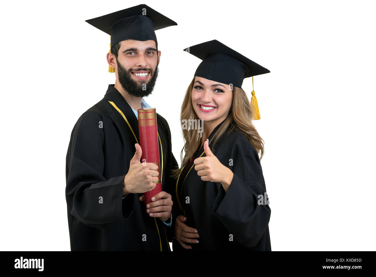 Portrait of two happy graduating students. Isolated over white ...