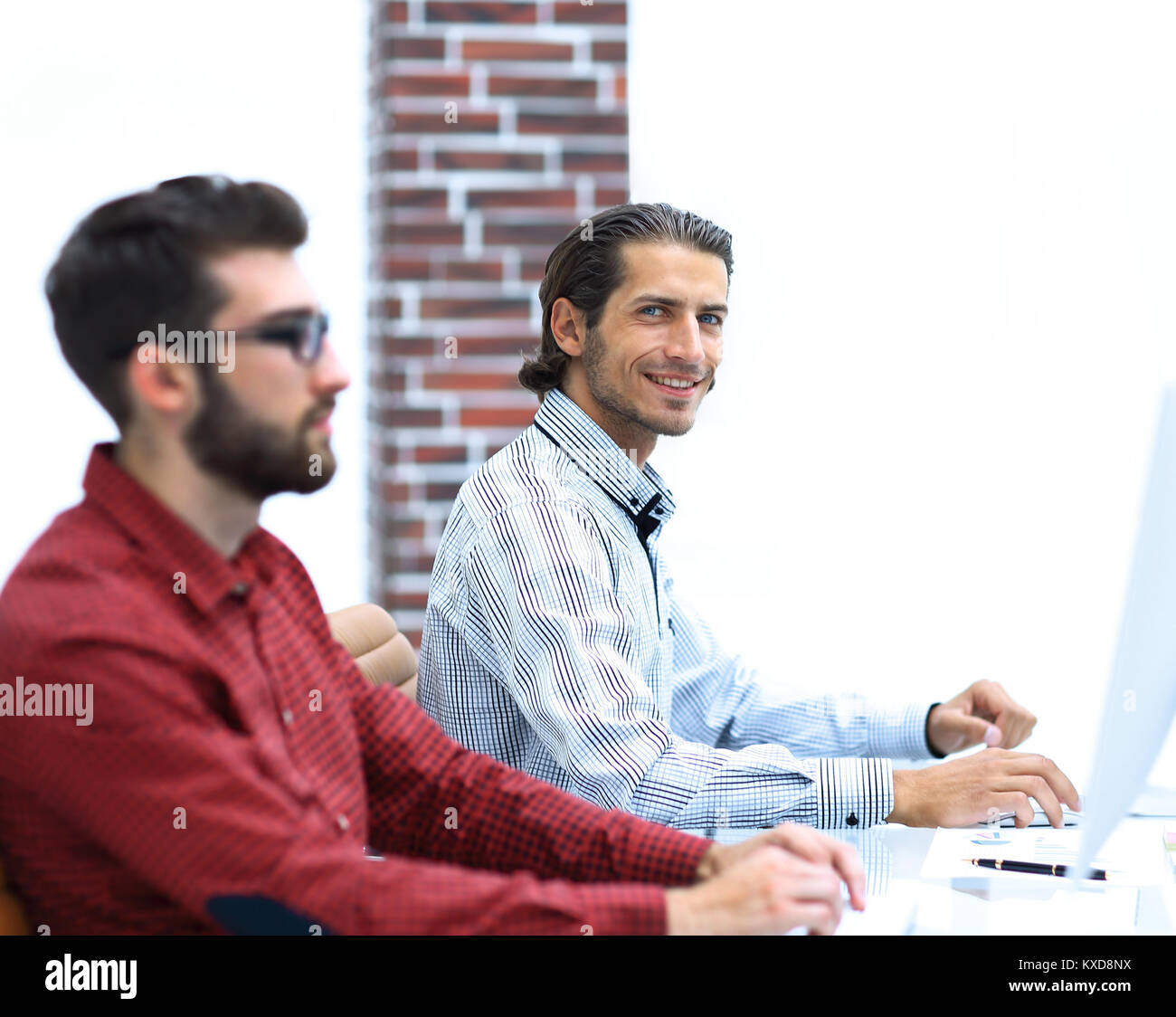 two employees work in the office Stock Photo - Alamy