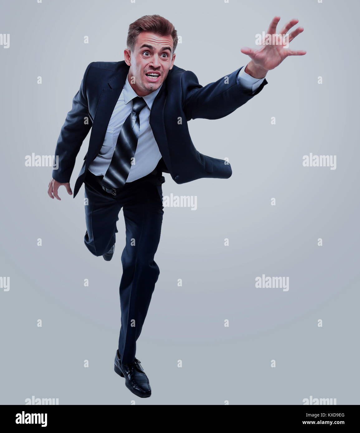 Happy running businessman. Isolated on white background Stock Photo - Alamy