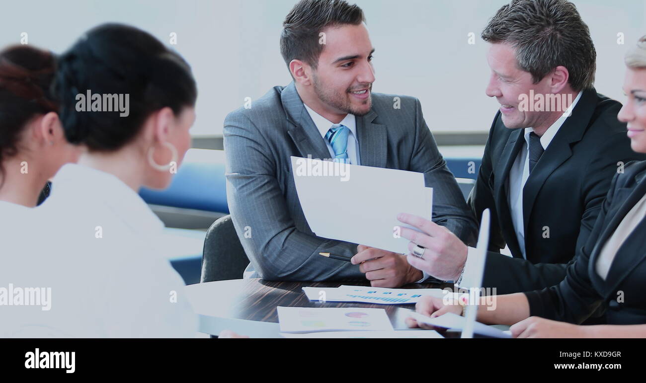 Business people working around table in modern office Stock Photo - Alamy