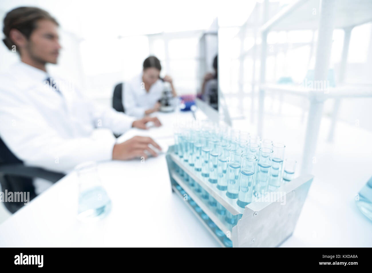 side view of scientists working in laboratory Stock Photo - Alamy