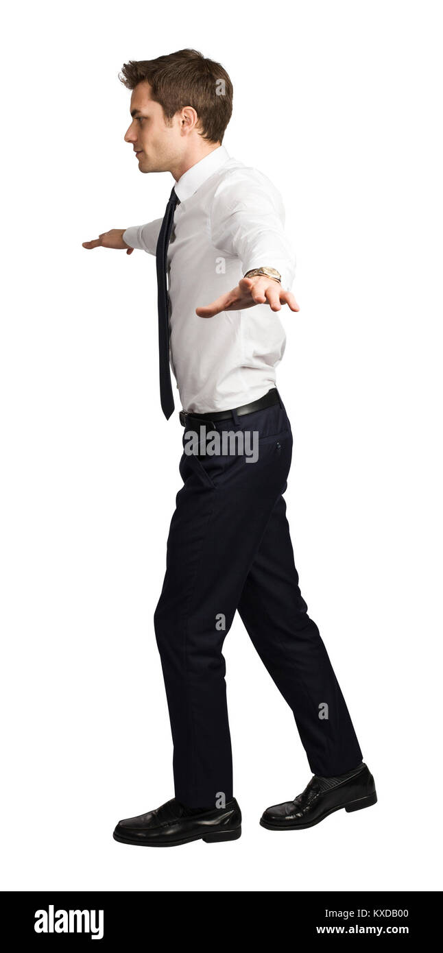 young caucasian businessman walk pose balance isolated on white ...